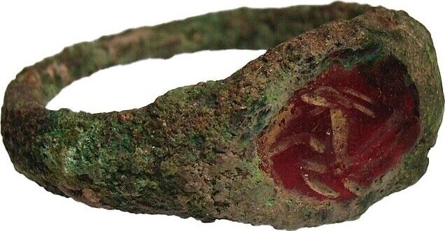 Roman finger ring with carnelian gem and gazelle decoration, bronze ...