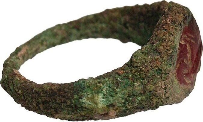 Roman finger ring with carnelian gem and gazelle decoration, bronze ...