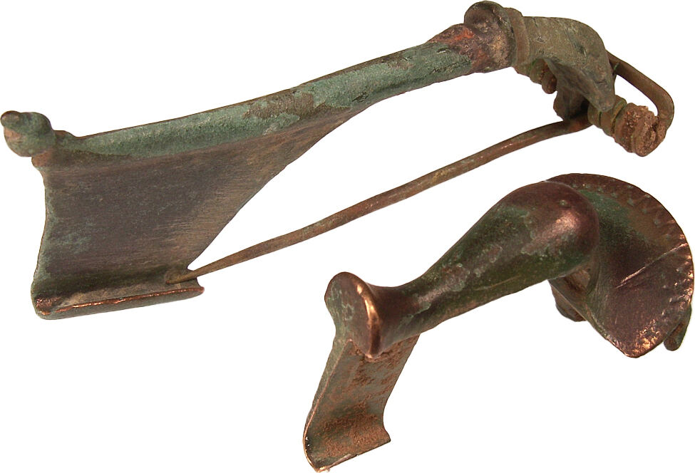 Ancient Roman Roman trumpet brooch and knee brooch decorated garment ...