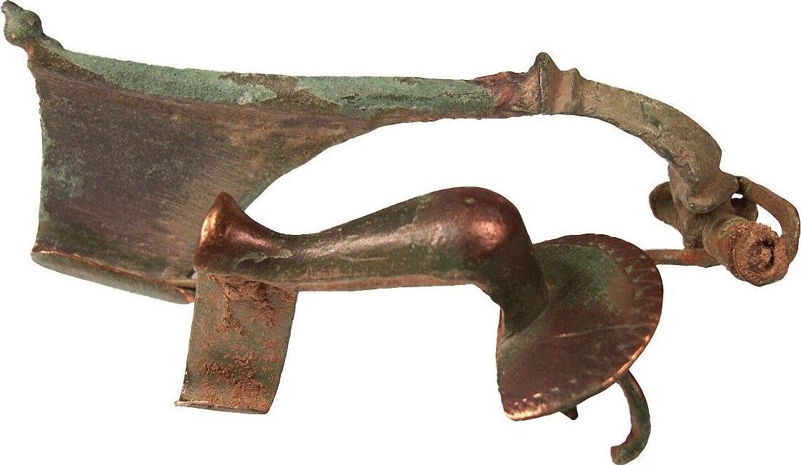 Ancient Roman Roman trumpet brooch and knee brooch decorated garment ...