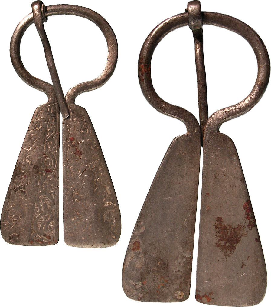 Viking Omega robe brooch with rich, wave-like decorations made of ...