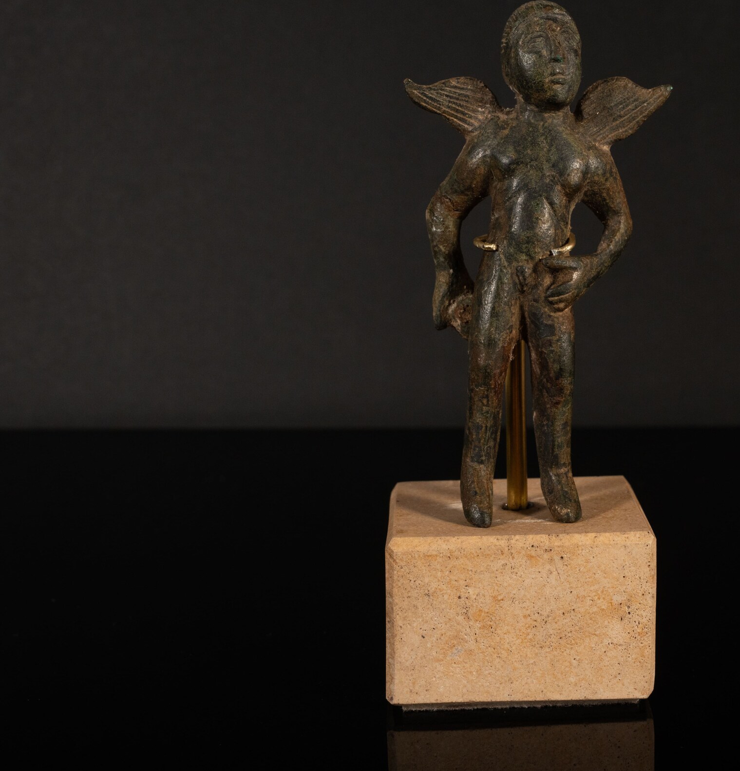 Ancient Roman bronze figure of Cupid on a marble base. Angel with wings ...