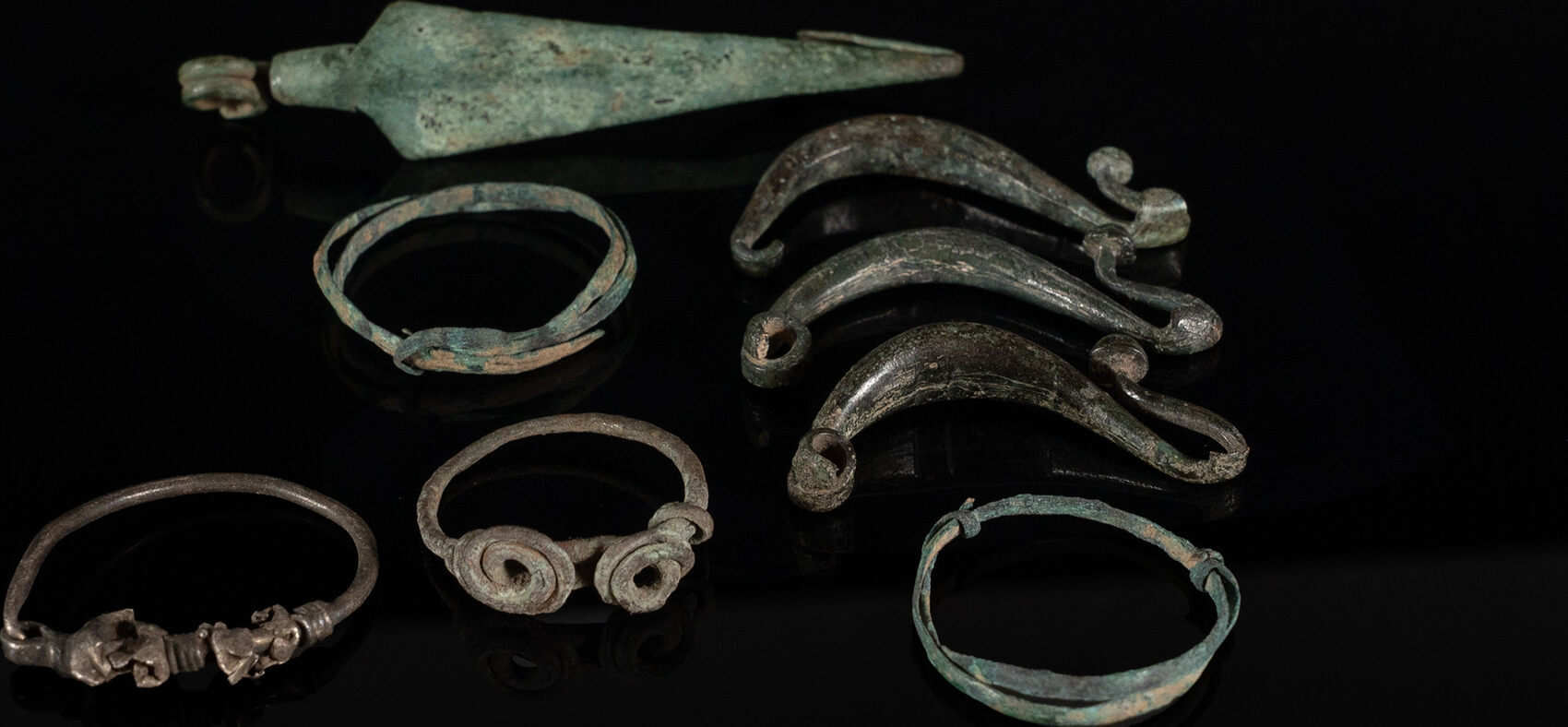 Bronze Age jewelry group with brooches and rings from the bronze ...