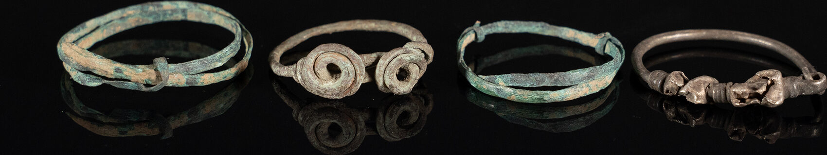 Bronze Age jewelry group with brooches and rings from the bronze ...