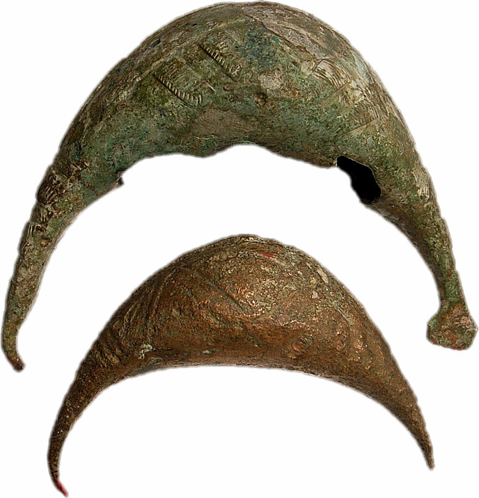 Hallstatt period robe fibulae with bronze decoration, European. Iron ...