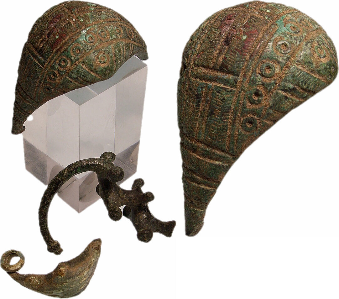 Hallstatt period robe fibulae with bronze decoration, European. Iron ...